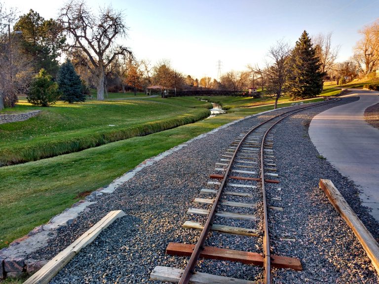 Train Tracks, Stream, and Path through Park – Photos Public Domain